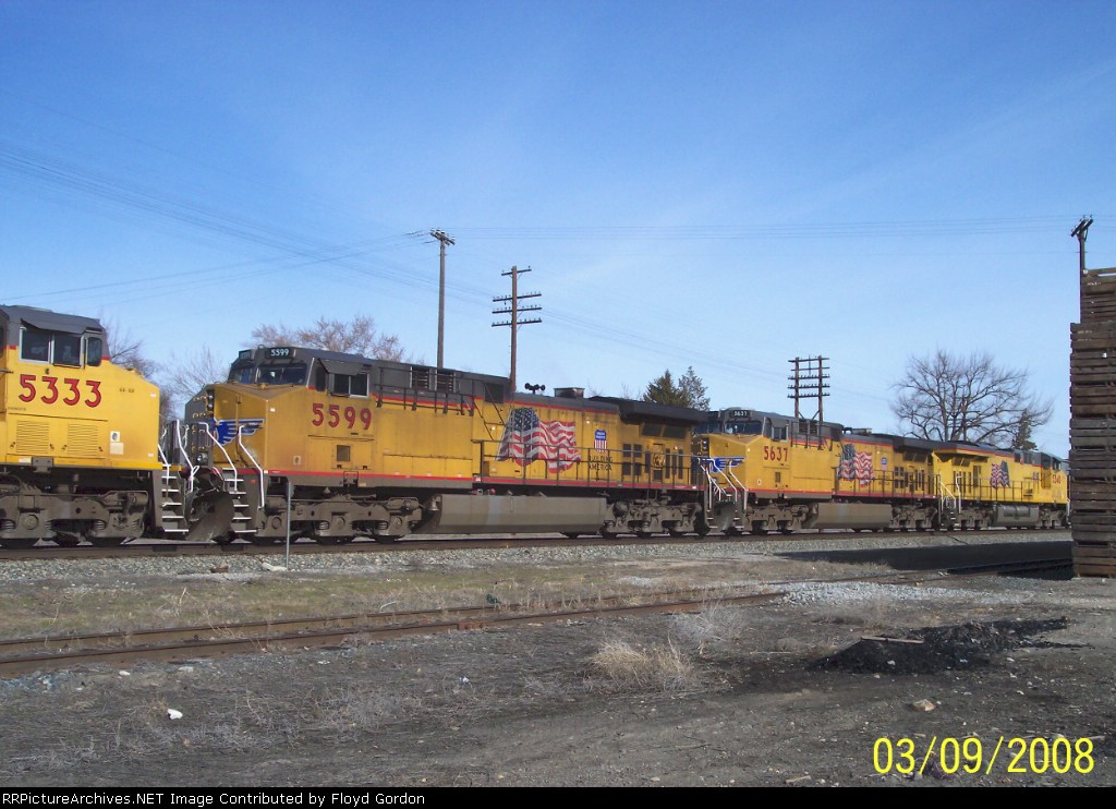 Midtrain distributed power units assist heavy grain train